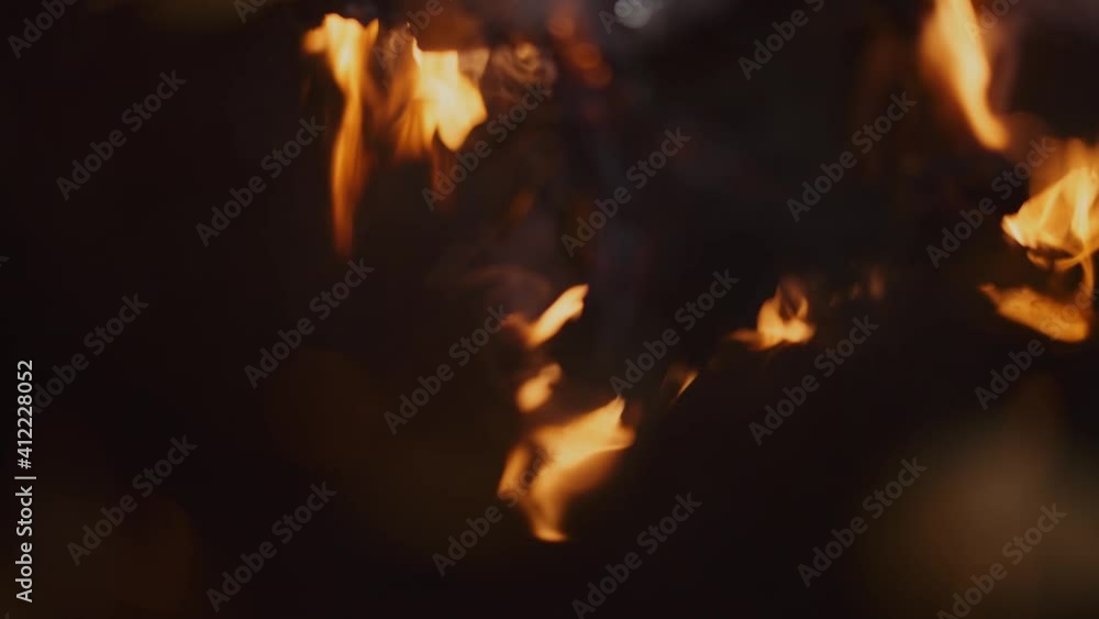 Burning flames on the ground. Campfire in the city, night scene. Flames ...