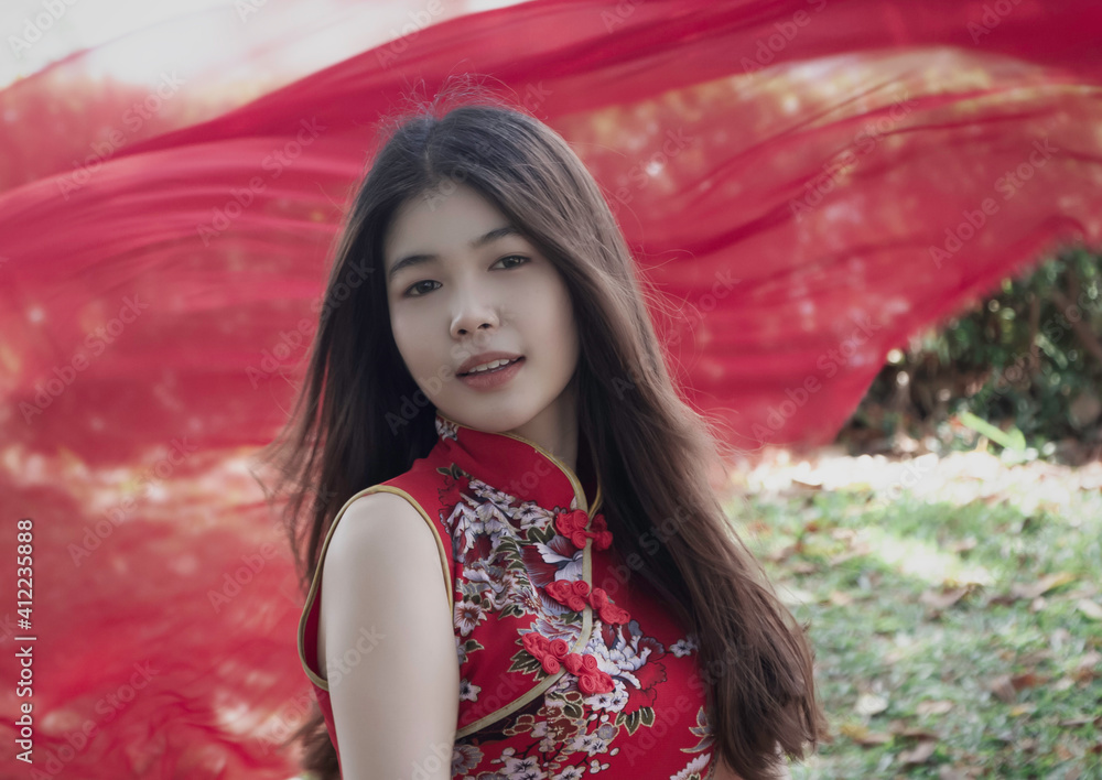 Young beautiful lady wearing Chinese red dress,portrail of model posing ...