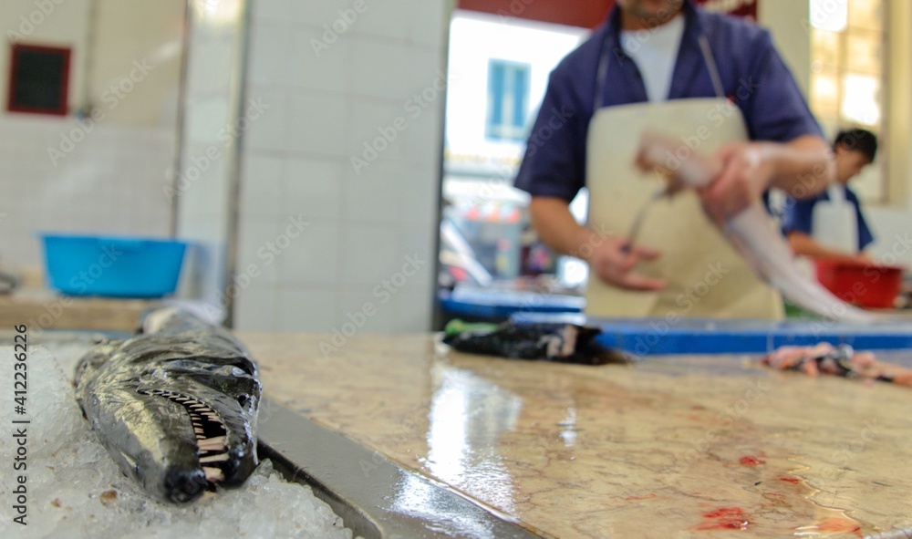 Fish At Fish Market With People In Background Stock Photo | Adobe Stock