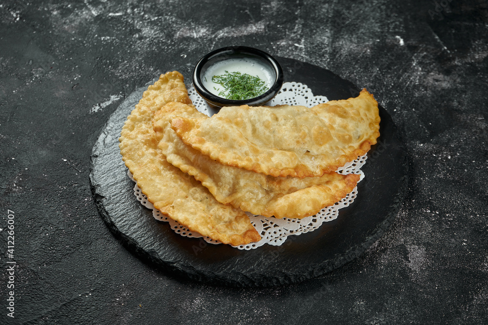 Chebureki is a deep-fried turnover with a filling of ground or minced ...