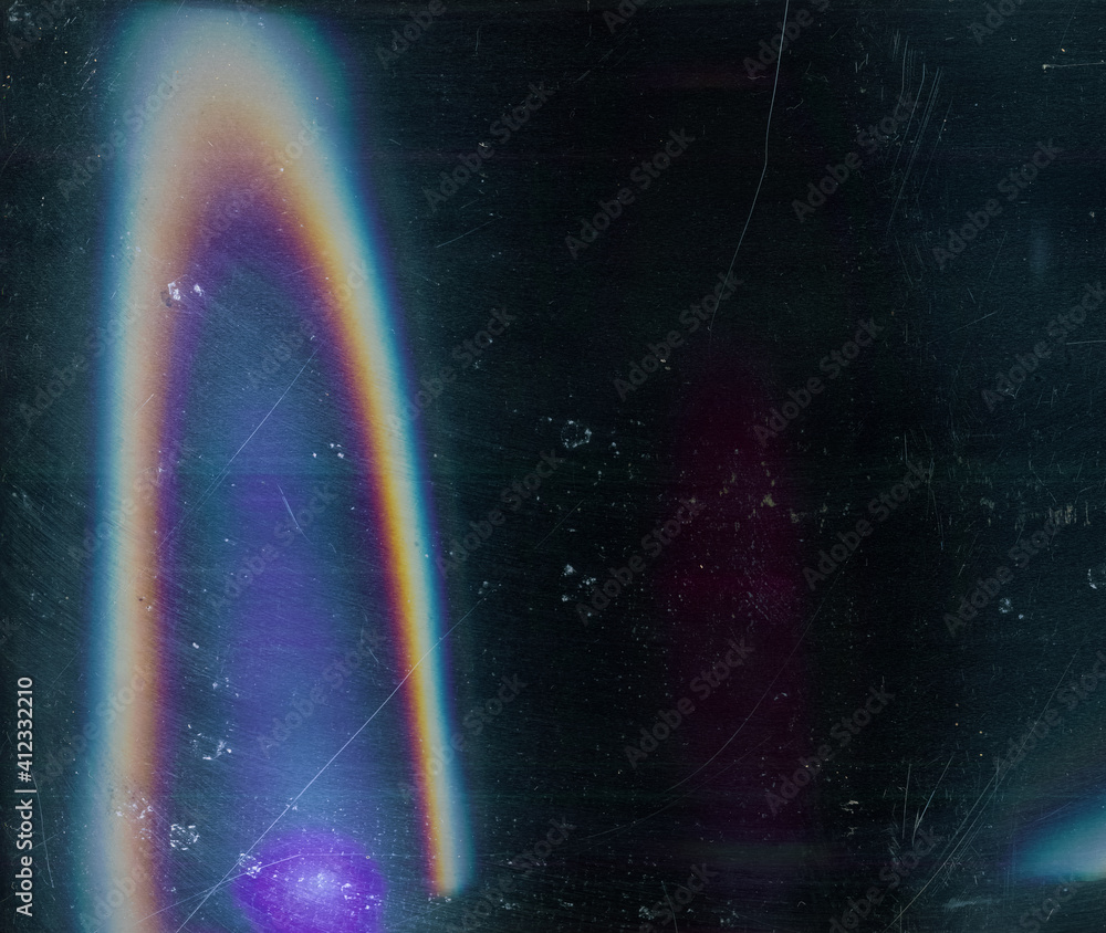 Distressed background. Rainbow lens flare. Dark old weathered grunge ...