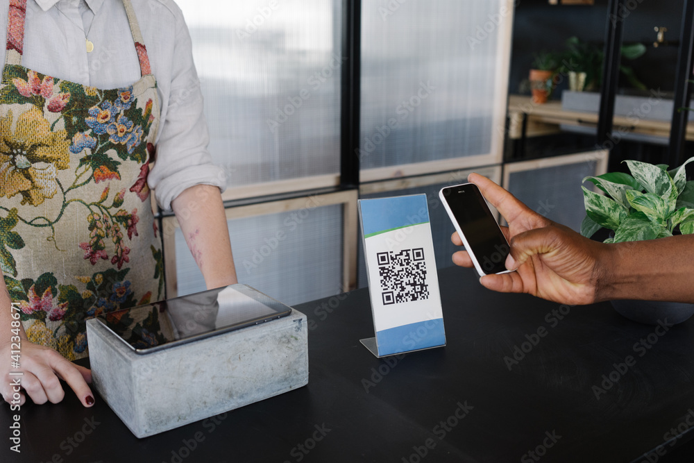 Paying with QR code Stock Photo | Adobe Stock