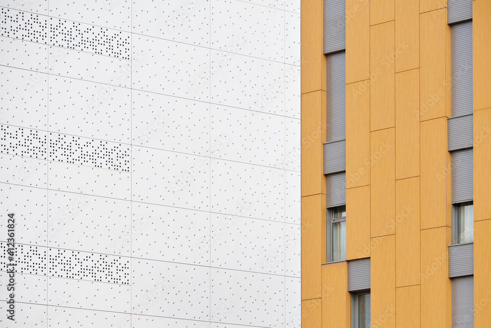 White and yellow building exteriors. Stock Photo | Adobe Stock