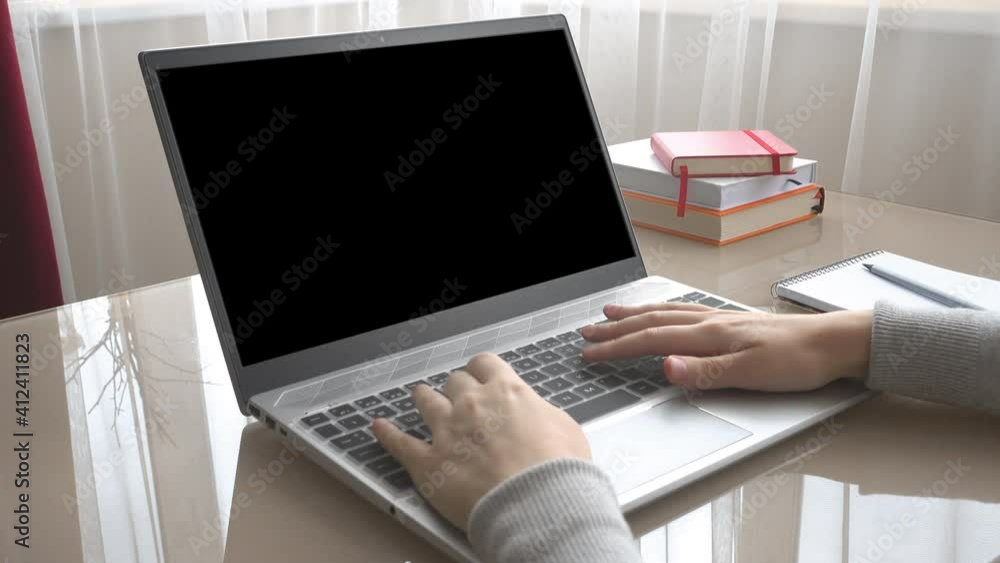 The girl working at home office hands on keyboard. Alpha channel ...