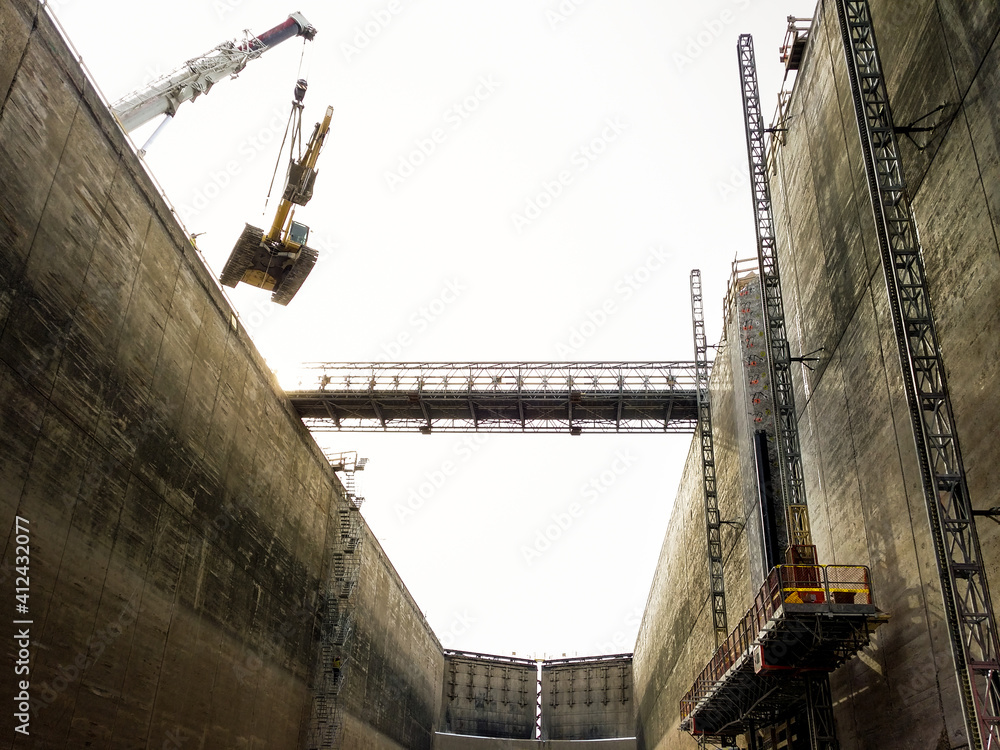 Crane Lifting Excavator From Public Infrastructure Construction Stock ...