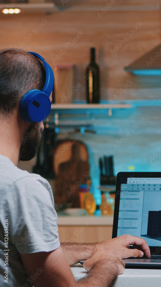 Man designer using cad software to design a 3D concept of buildings ...