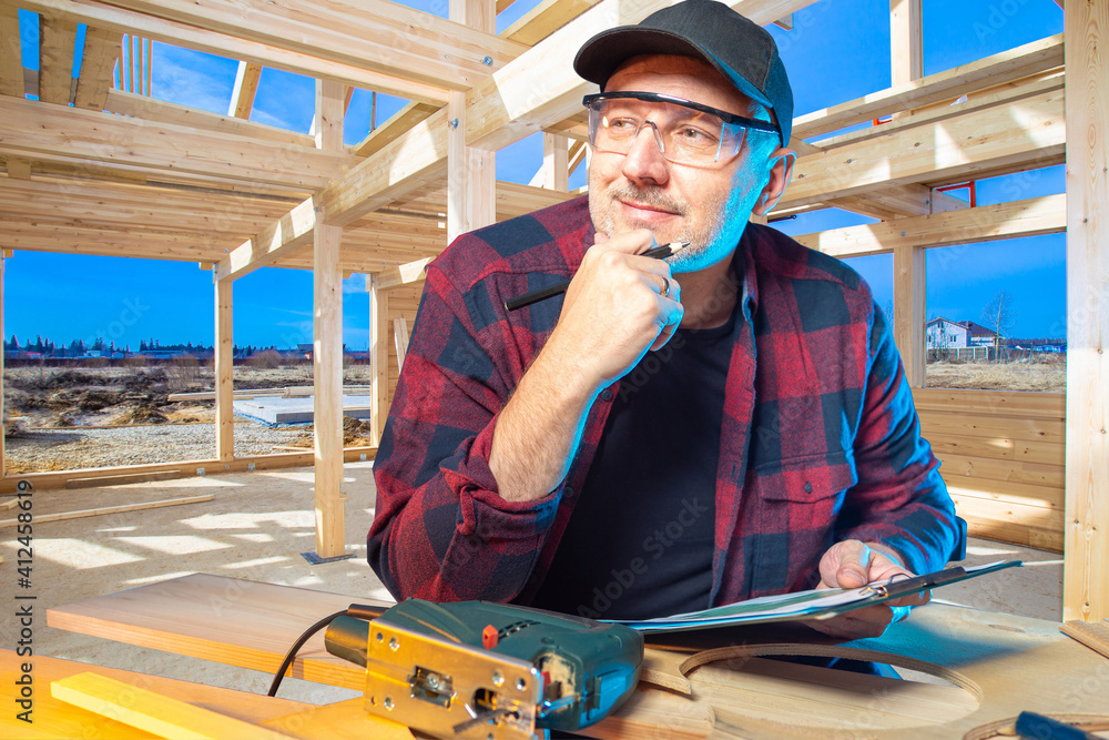 Frame of building house. Construction of the cottage timber. The wooden ...