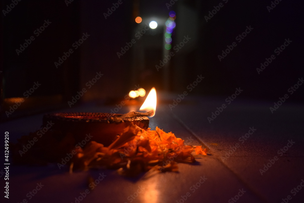 From darkness to light, Diya during Diwali, Indian Festival Stock Photo ...