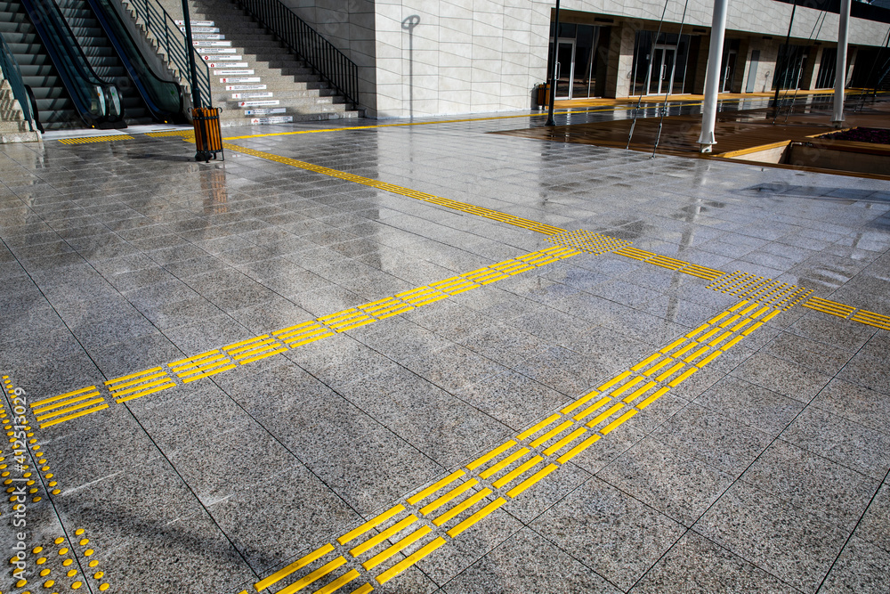 Bright yellow tactile paving for the visually impaired Stock Photo ...