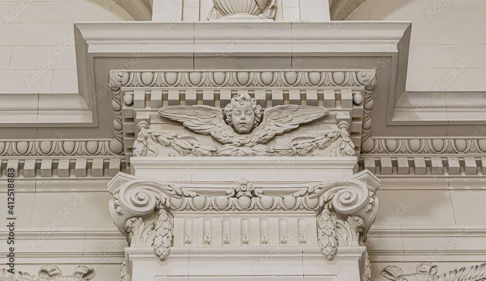 Foto de Column top, gypsum stucco molding with angel, wall texture and ...