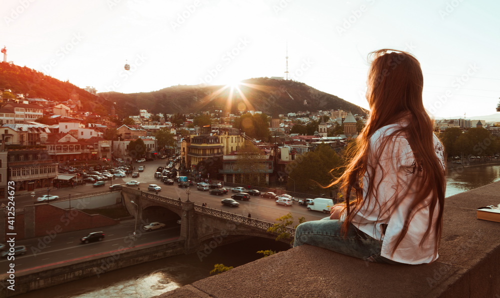 Girl Looking At Cityscape Against Sky Stock Photo | Adobe Stock