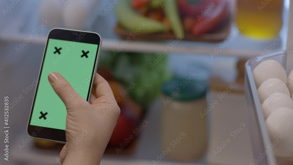 Vidéo Stock Mobile phone with green screen tracking point with a ...