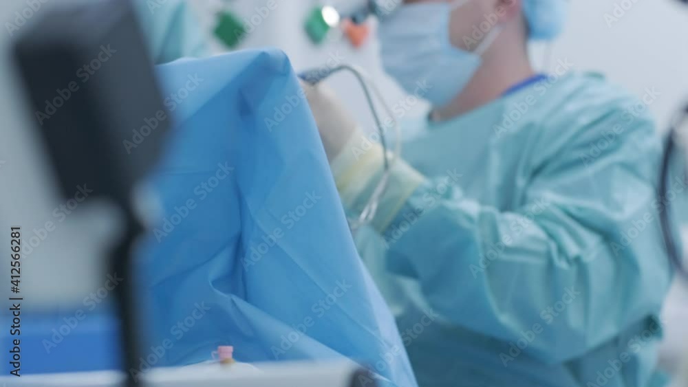 Operation of removing tonsils. tonsillectomy under deep anesthesia ...