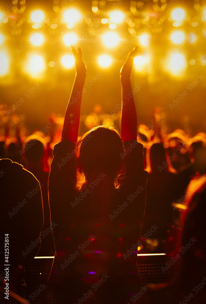 Crowded dance floor in night club.Group of people partying on ...