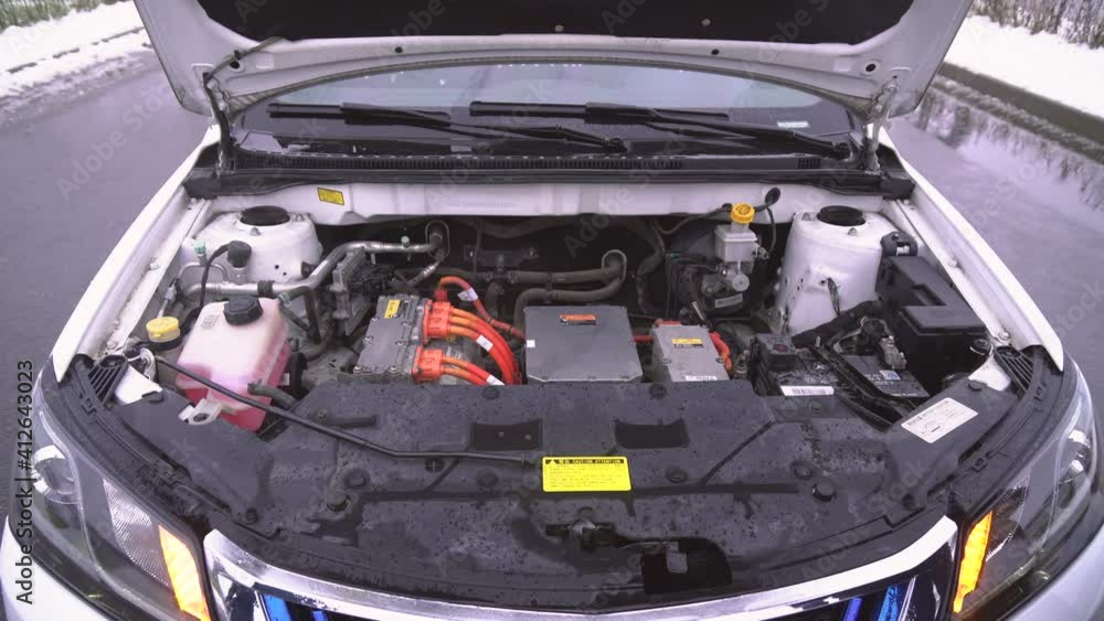 Close up detailed view of the broken electric car engine. Electric ...
