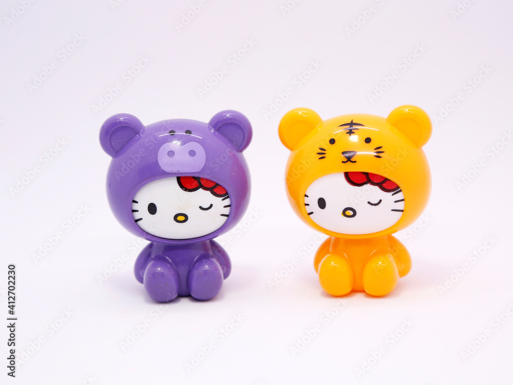 Hello Kitty disguised as a lion and a pig. Hello Kitty with kigurumi ...