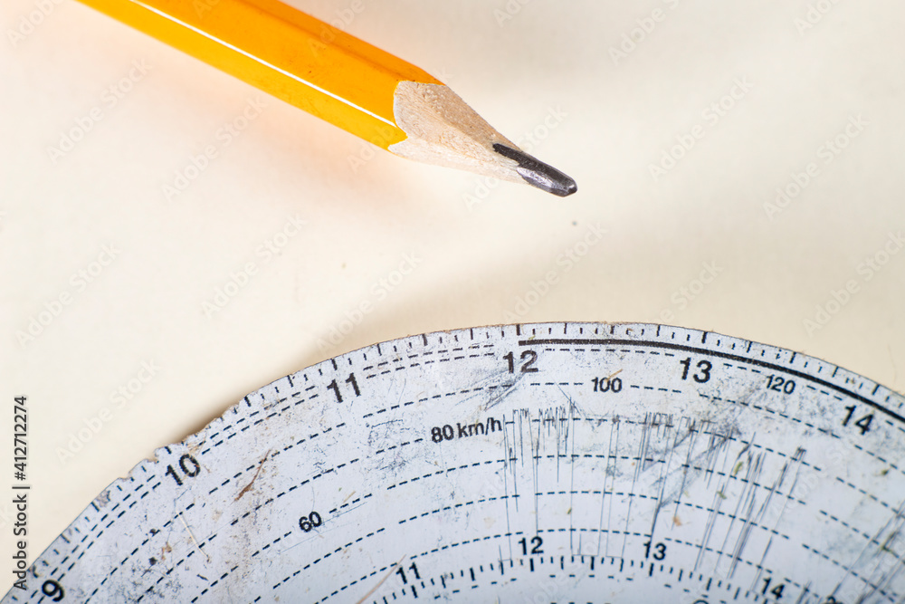 Tachograph chart and pencil for recording the time and mileage of a ...