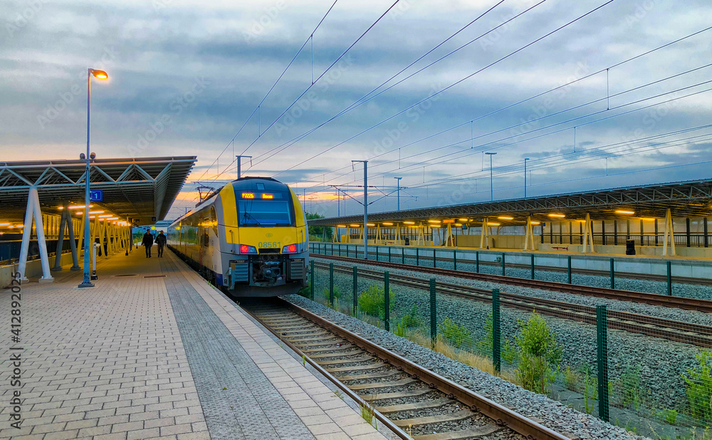 Brecht, Belgium - June 2019: A commuter train of there Belgian Railways ...