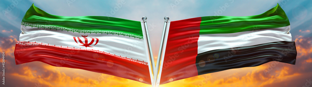 United Arab Emirates Flag and Iran flag waving with texture sky Cloud ...