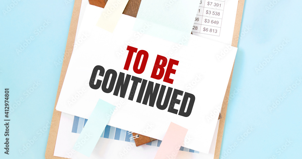 Paper plate with text take To be continued. Diagram, notepad and blue ...