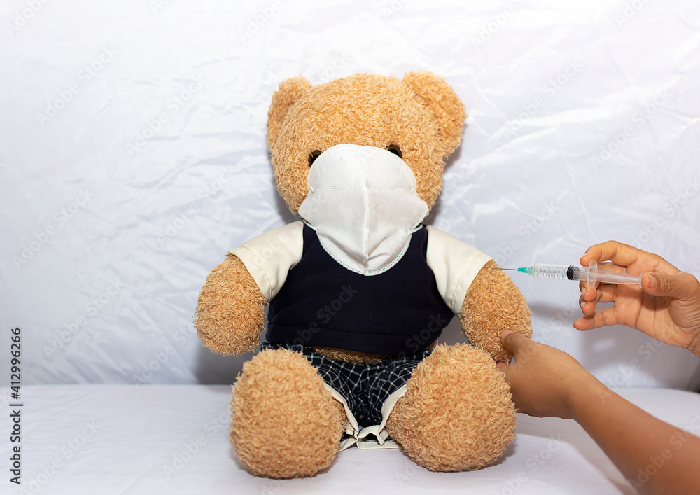 INJECTION OF THE VACCINE TO A COVIT BEAR Stock Photo | Adobe Stock