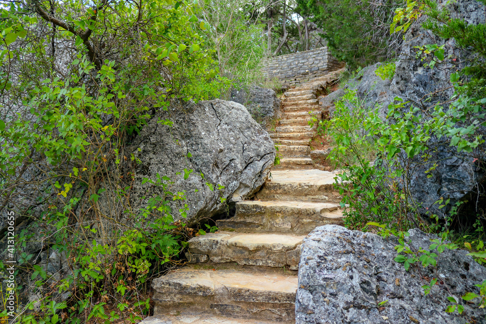 Limestone steps lead up the hill through the beautiful geological ...