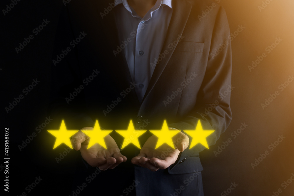 Man hand showing on five star excellent rating.pointing five star ...