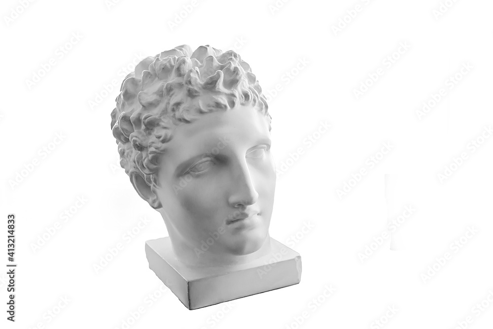 Plaster statue of the head of an ancient Greek God. Plaster replica of ...