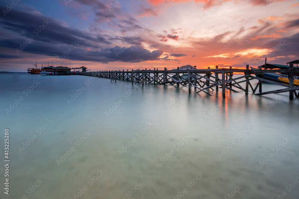Kenawa Island in the sunset. Kenawa Island is one of the islands in the ...