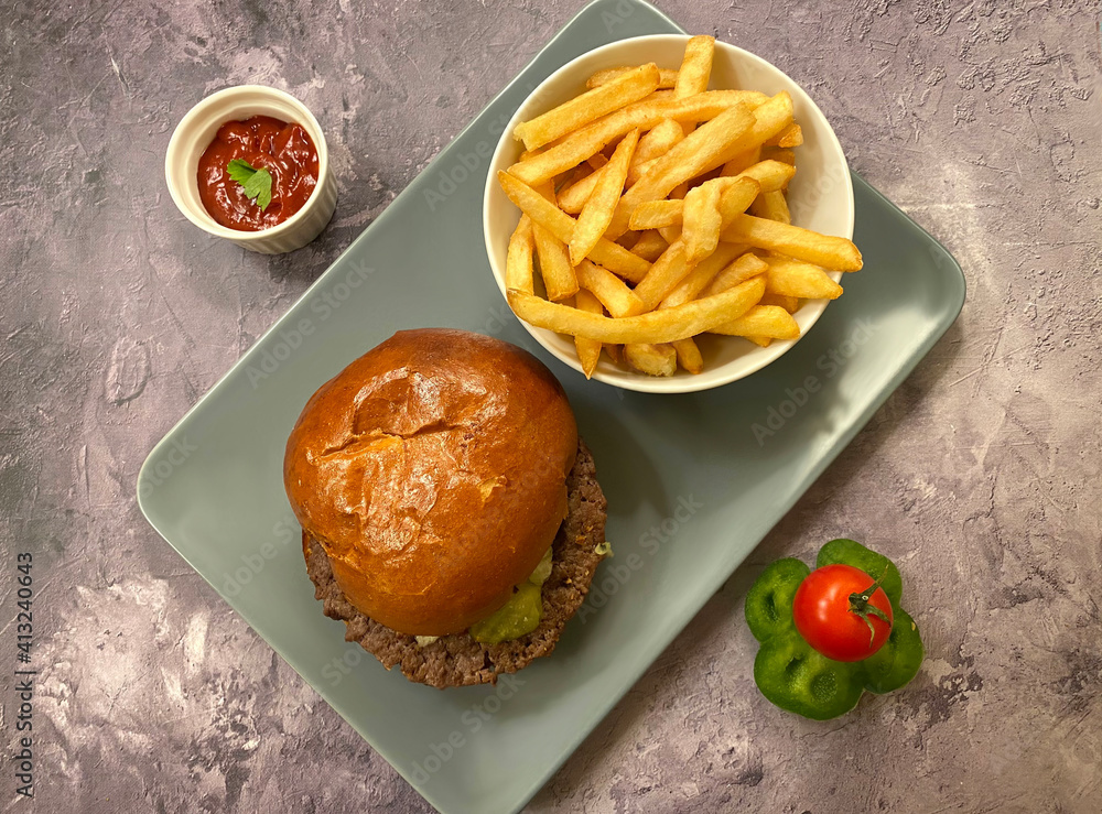 Classic beef burger, also known as beef patty with ketchup, pickled ...