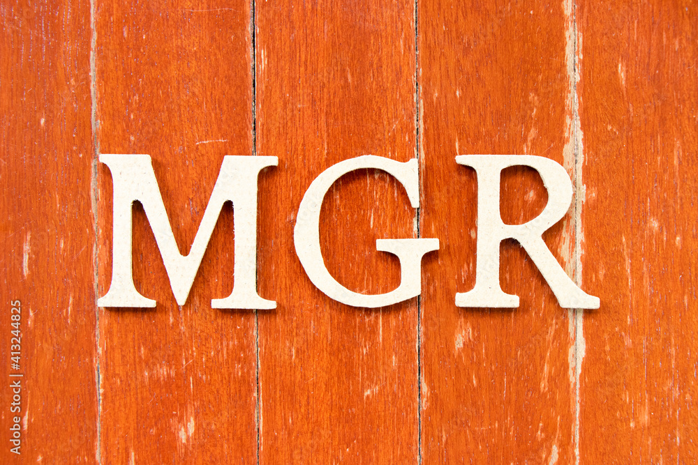 Alphabet letter in word mgr (abbreviation of manager) on old red color ...