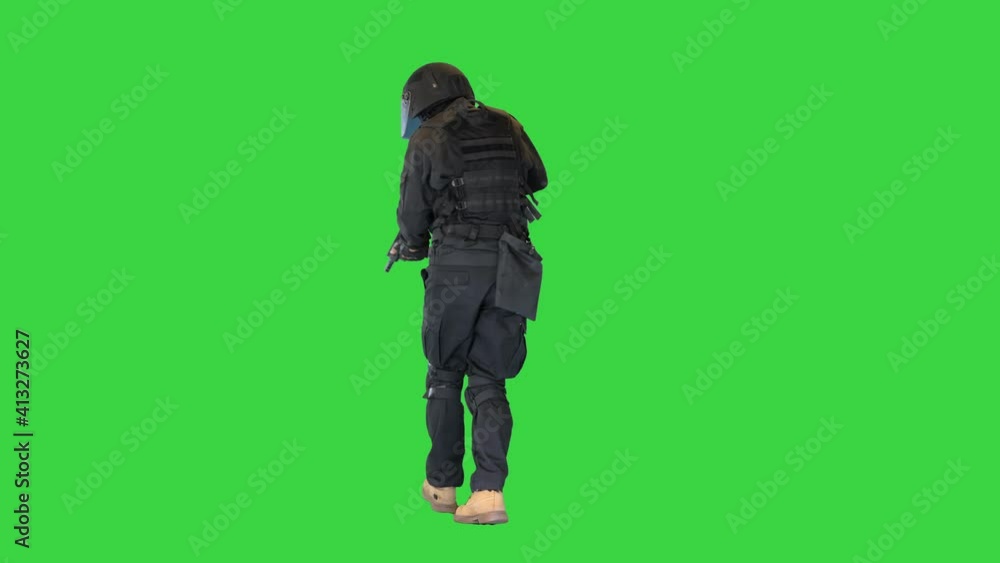 Vídeo do Stock: Masked Armed SWAT Police Officer Walking and aiming ...