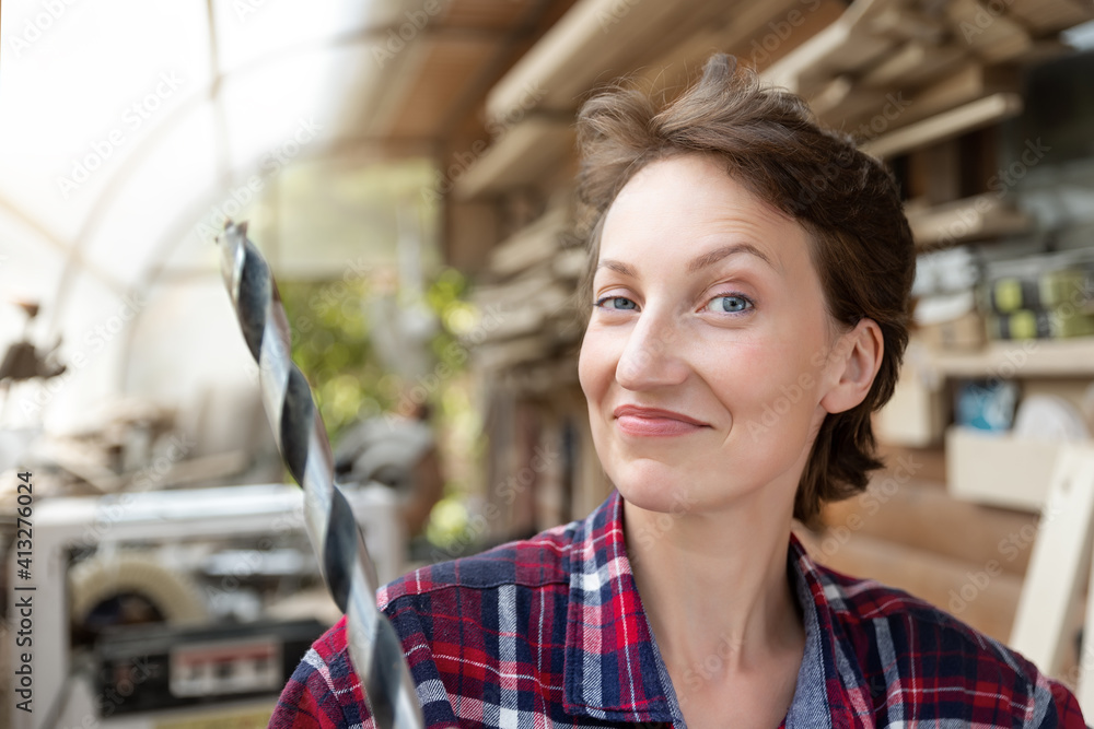 Young adult beautiful handy professional happy female carpenter with ...