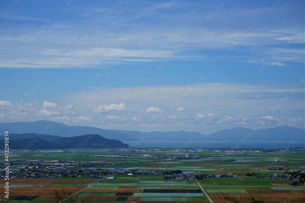 Aerial view of Lake biwa (Nishinoko) and city of Shiga from peak of ...