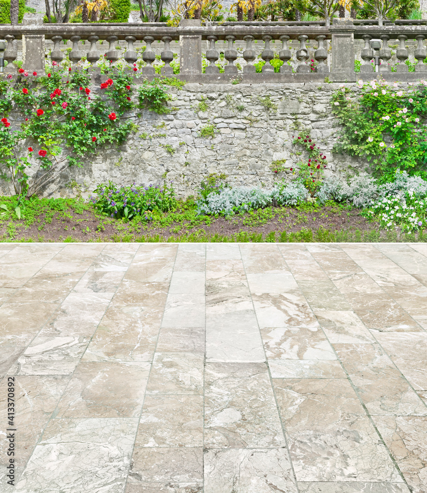 Beautiful garden terrace with rose bush and natural stone paving. Stock ...