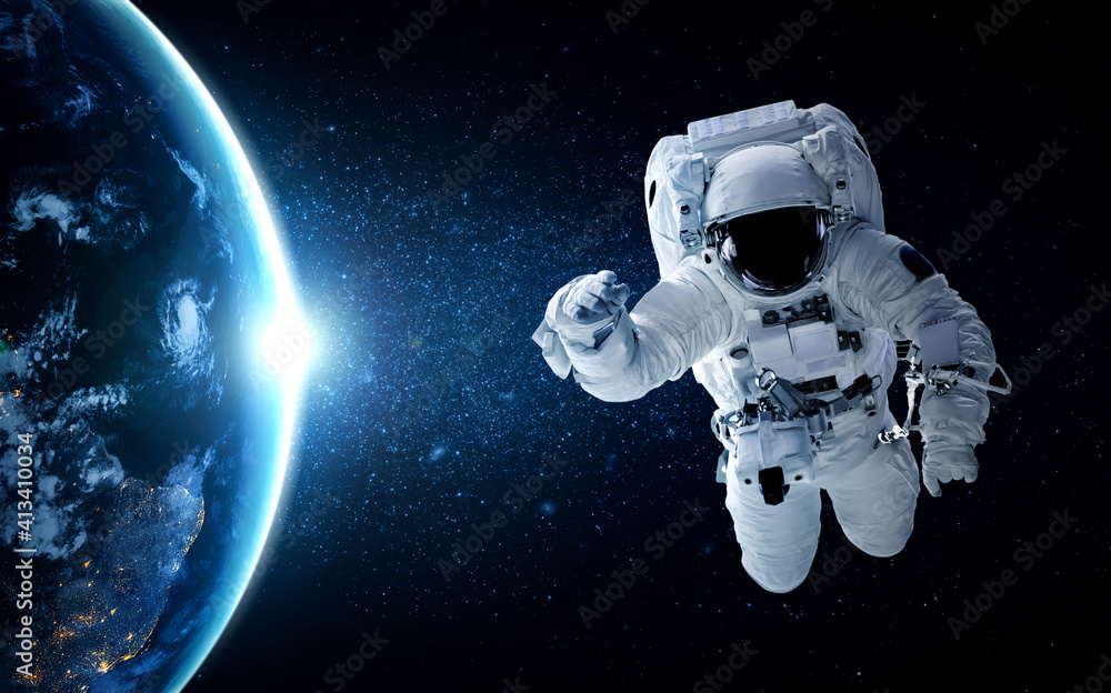 Astronaut spaceman do spacewalk while working for space station in ...