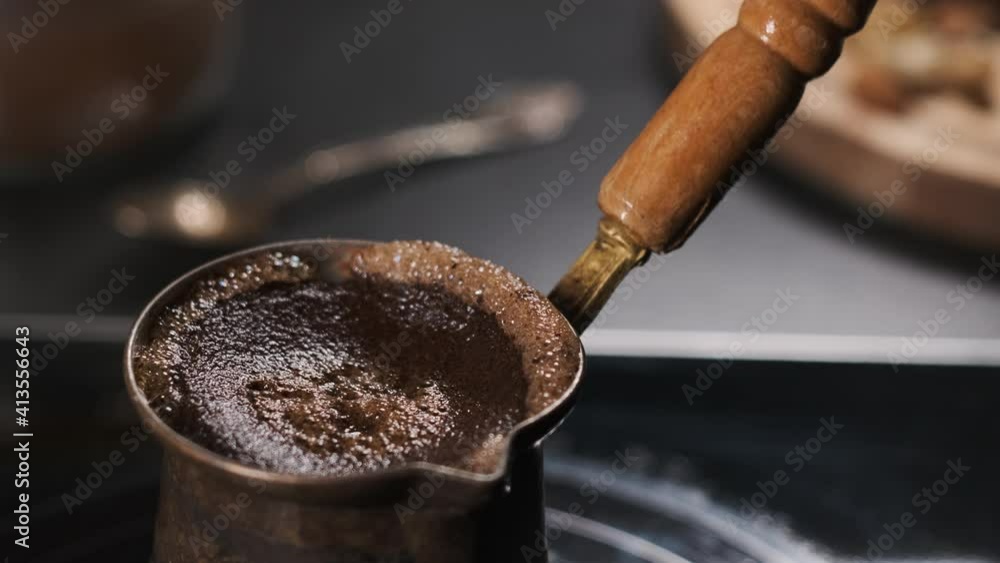 Boiling coffee in Stove Top Coffee Maker. brews coffee on stove in ...