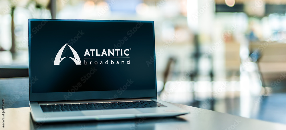 Laptop computer displaying logo of Atlantic Broadband Stock Photo ...