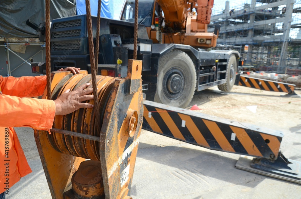 Crane operator conducting safety inspecting on the wire sling which ...