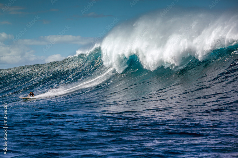 Jaws, big wave surfers taking off on a wave at Peahi on the Northshore ...