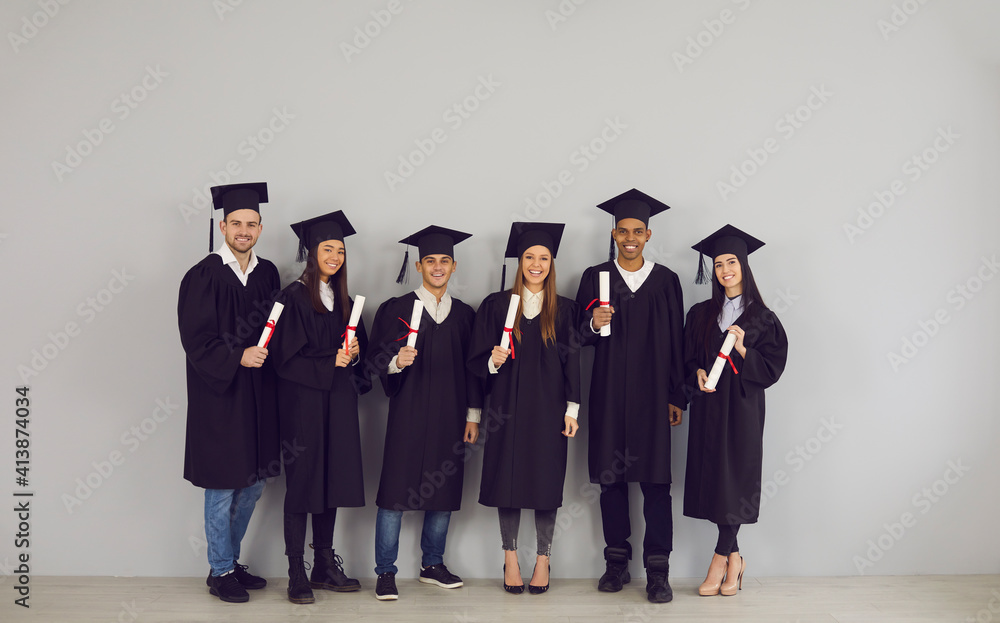 Group of smiling students multiethnic university graduates standing ...