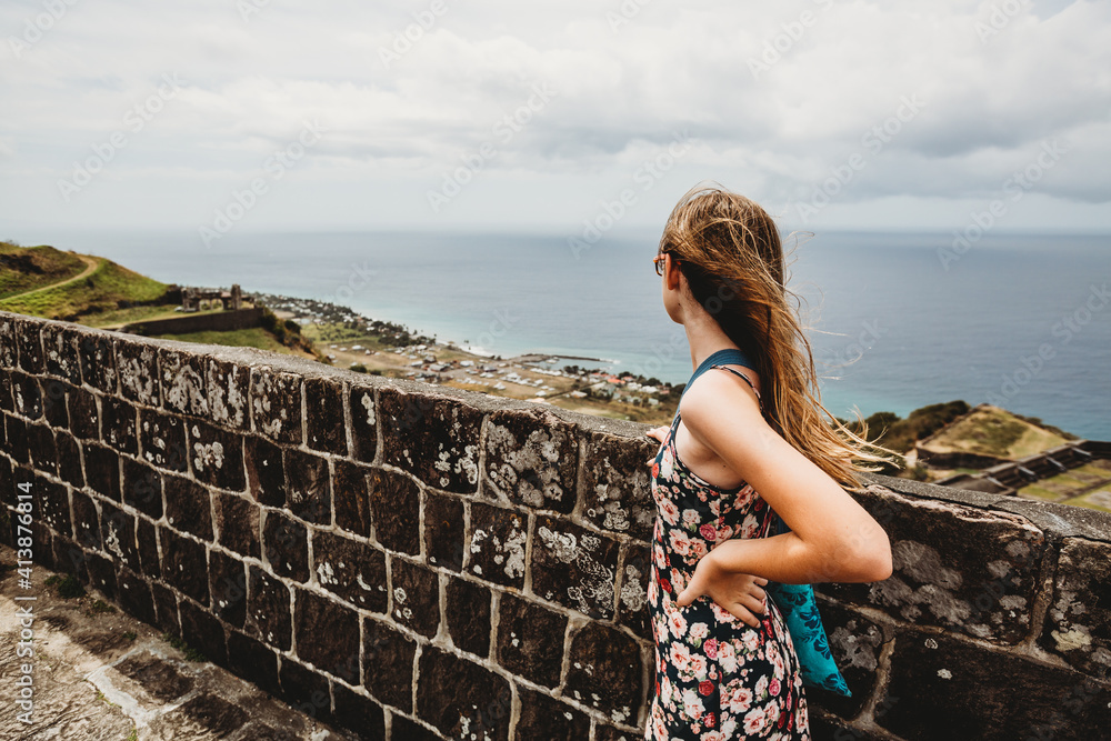 Tween girl looks at gorgeous view on St Kitts Cruise Port Stop foto de ...