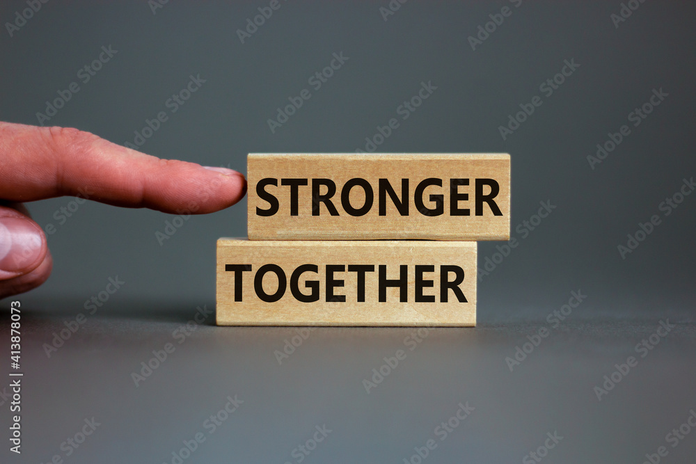 Stronger together symbol. Concept words 'stronger together' on wooden ...