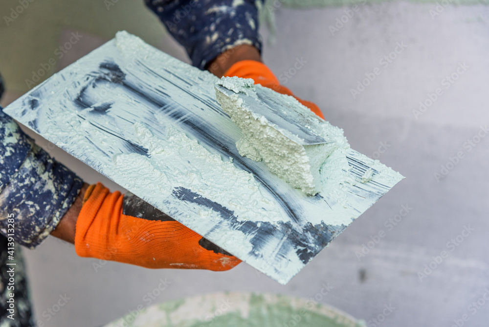Application Of Facade Plaster outdoor. Stock Photo | Adobe Stock