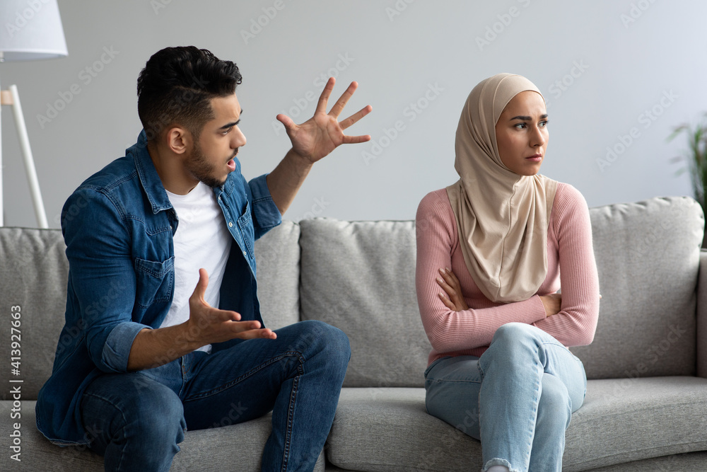Angry muslim man and woman fighting at home Stock Photo | Adobe Stock