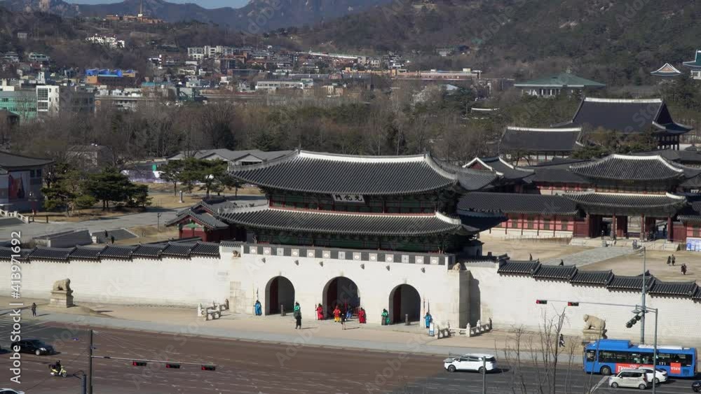 Guards in old traditional Korean warrior costumes standing in front of ...
