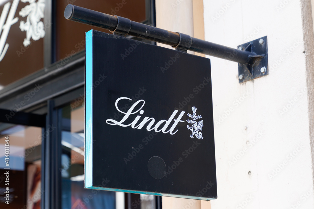 Lindt logo sign and brand text logo of store swiss chocolate and sweets ...