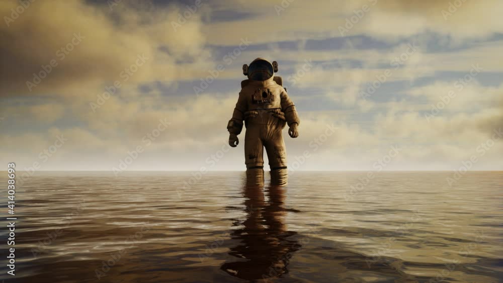 Spaceman in the sea under clouds at sunset Stock Video | Adobe Stock