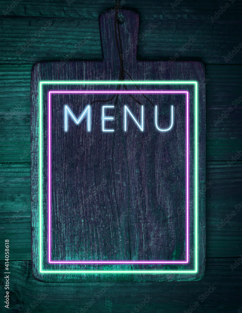 vintage wooden brown cutting board with neon green and pink lights ...