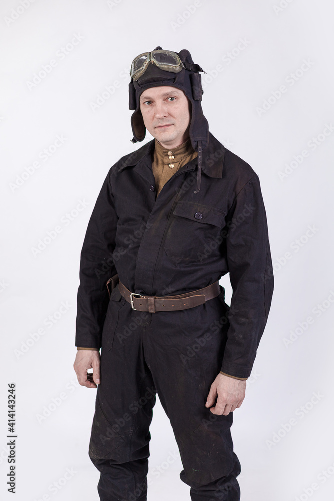 Portrait of a male actor in military uniform of an Russian tankman of ...